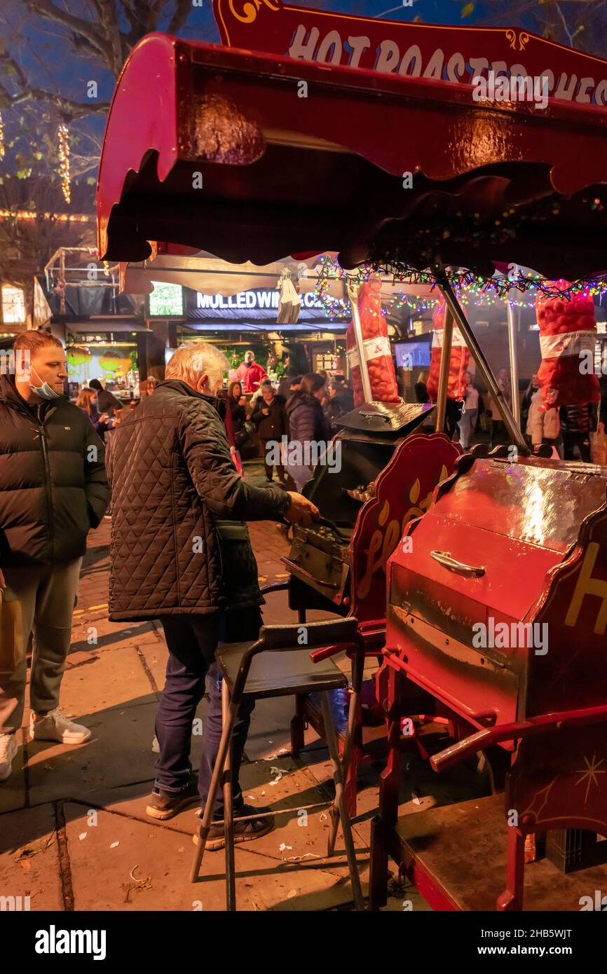 Cooking Chestnuts at Christmas Market Stock Photo - Alamy