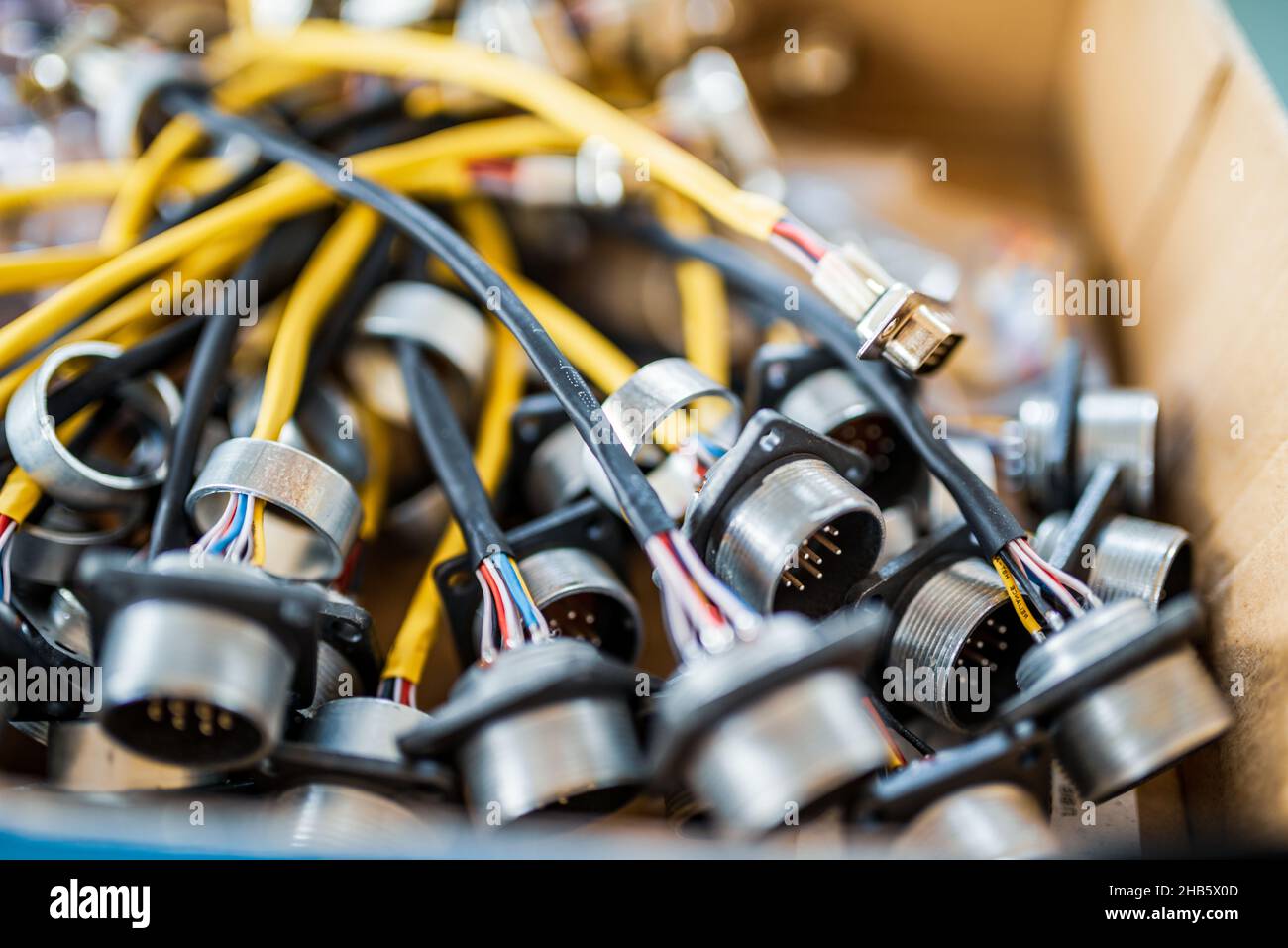 Bunch of cables with plugs for TFT displays in crate Stock Photo - Alamy