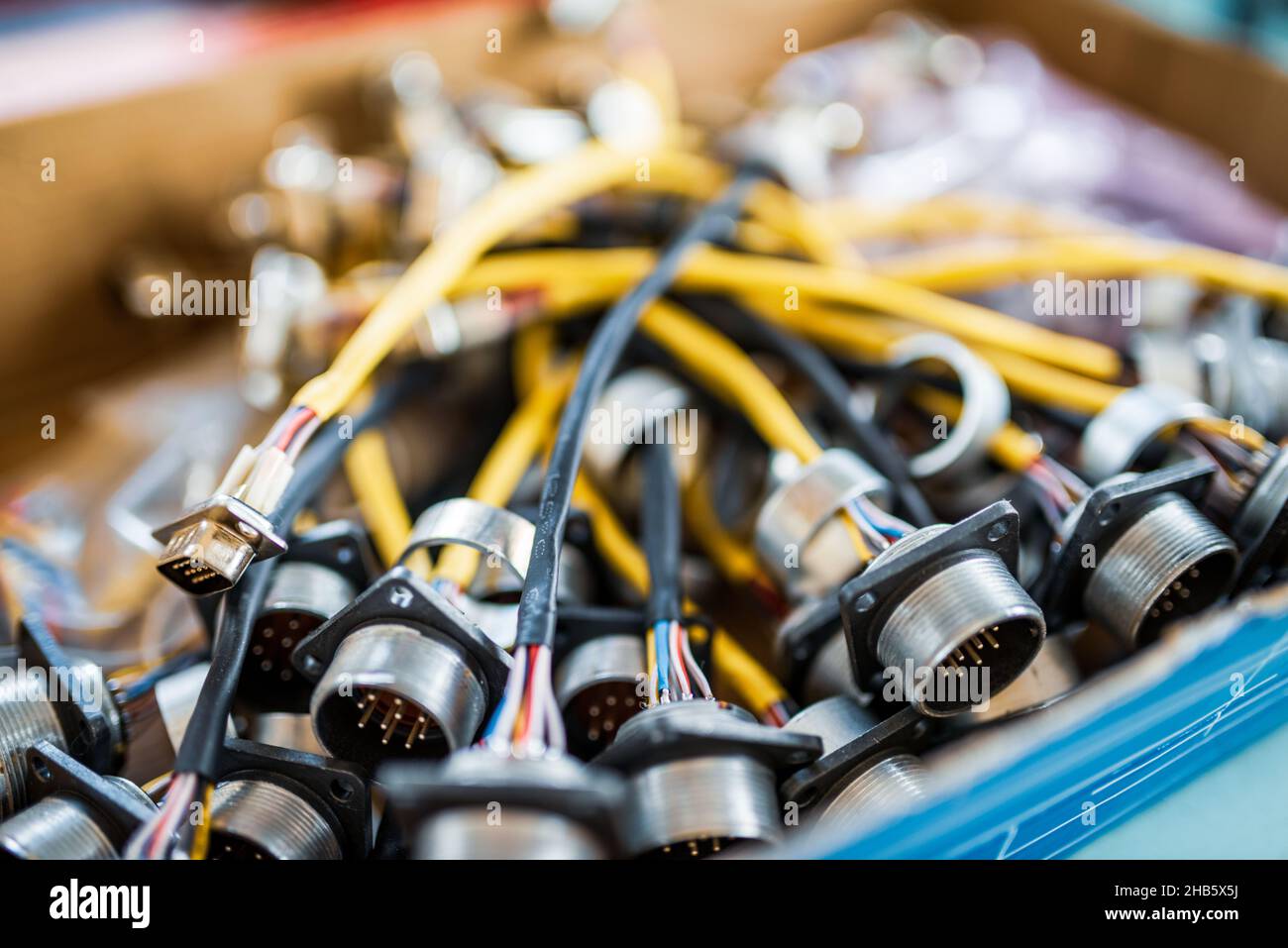 Bunch of cables with plugs for TFT displays in crate Stock Photo - Alamy