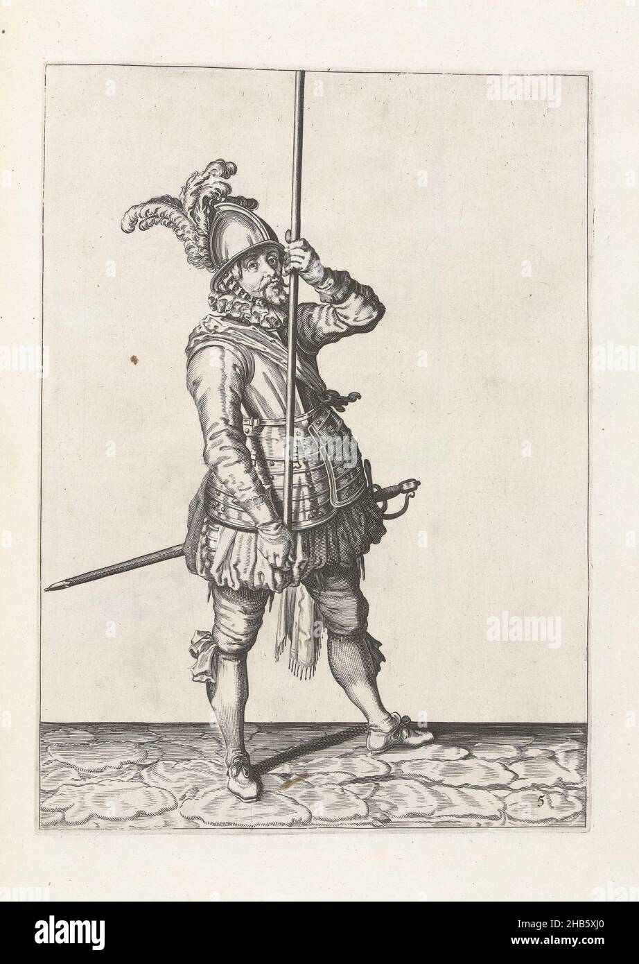 Soldier holding his spear with both hands upright in front of him high ...