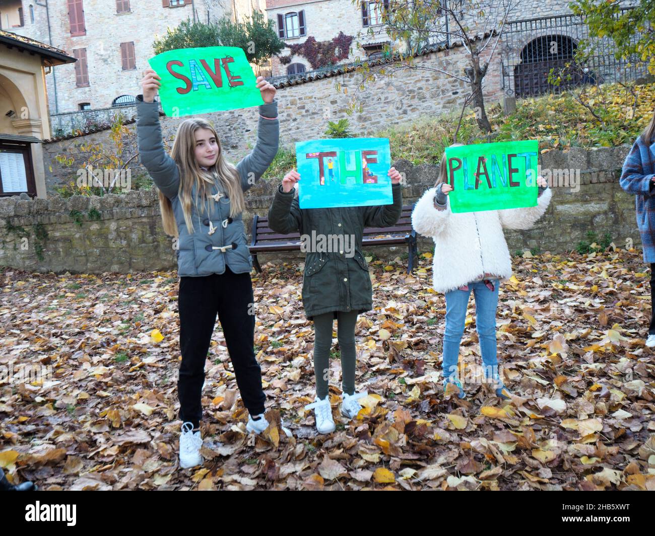 ecologist children girls playing to save the planet as evil toxic ...