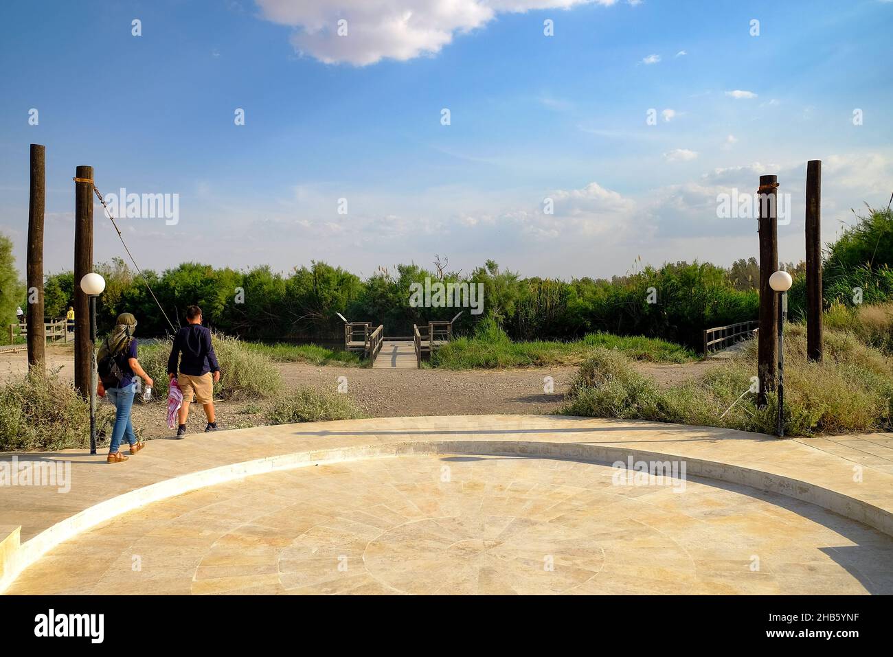 Rear view of travelers at the Azraq Wetlands Reserve in the eastern ...