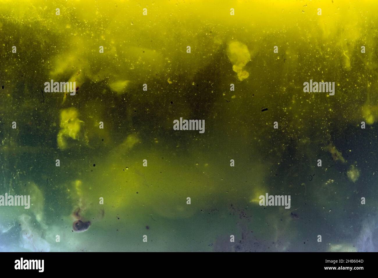 Yellow dirty liquid b Stock Photo - Alamy