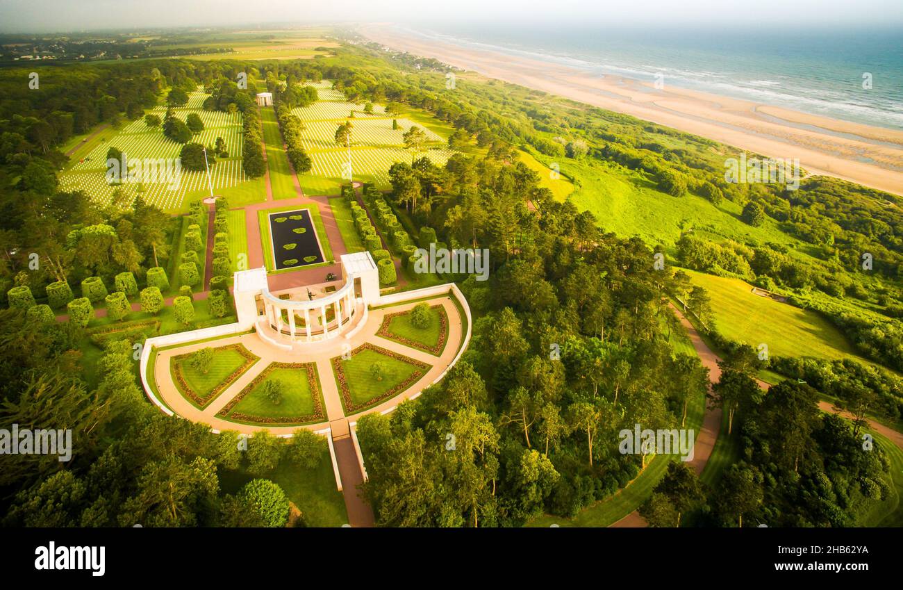Aerial view to dramatic normandy coast with memorial to dead american ...