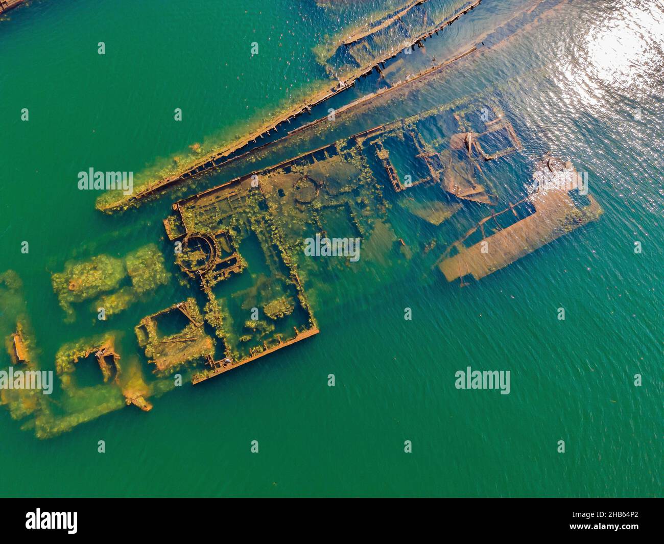 Abandoned broken shipwreck sticking out of the sea Stock Photo - Alamy
