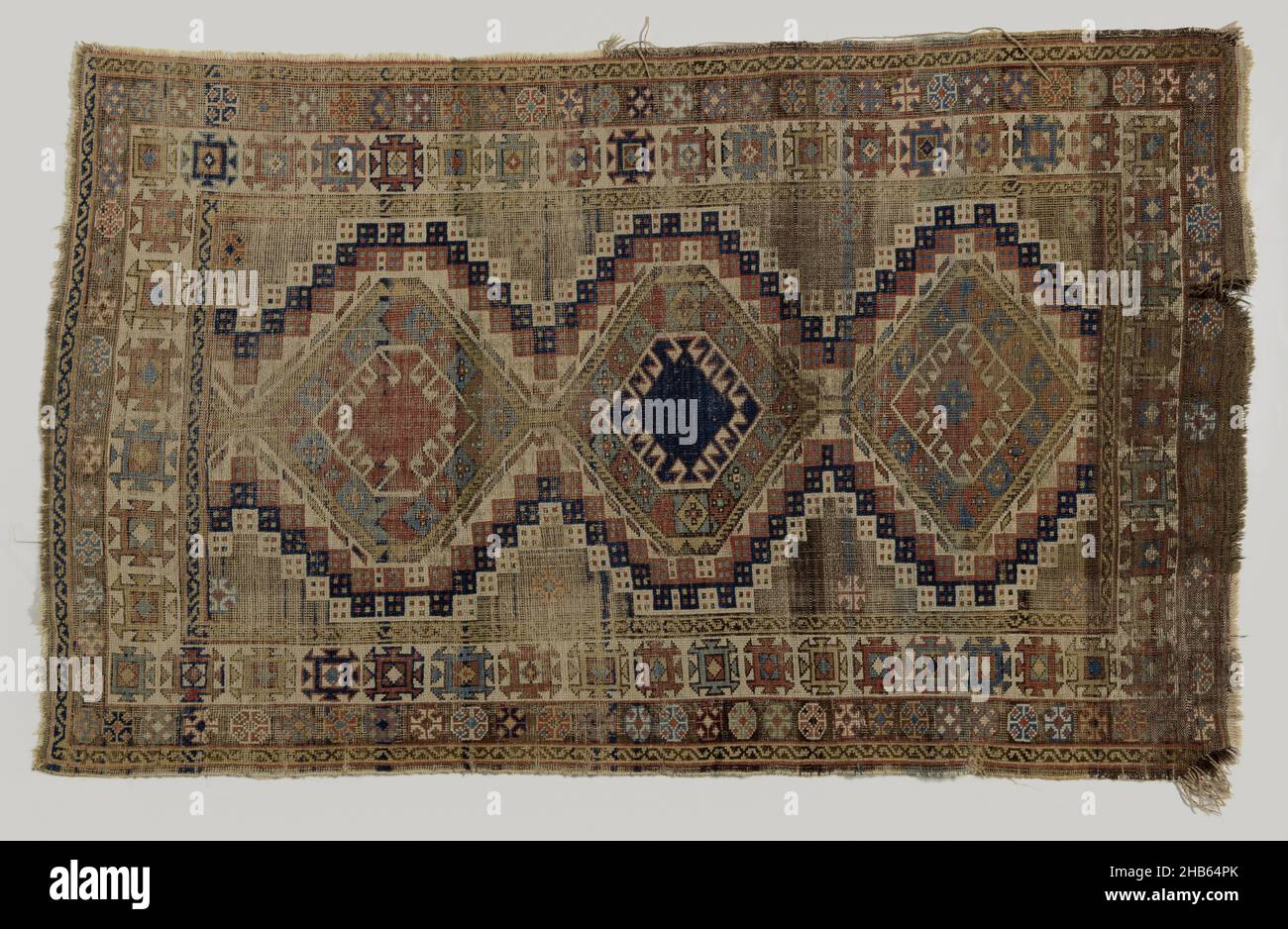 Wool carpet with geometric figures, Wool carpet. In the lengths three ...