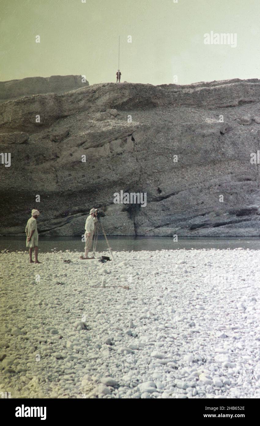 Surveying work on dry bed of River Nai Gaj gorge at low water ...