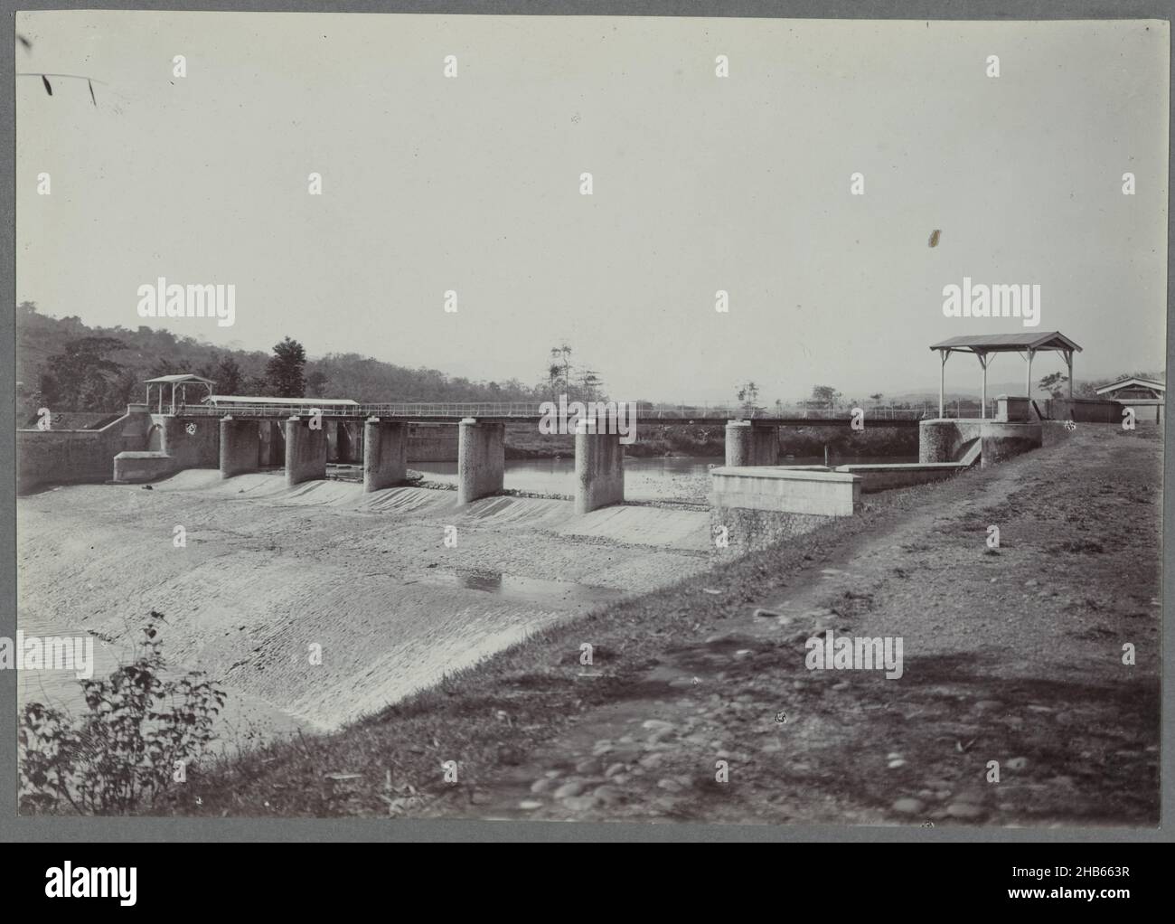 Dam by a canal, A dam by a canal. Part of the photo album of the Tjomal ...