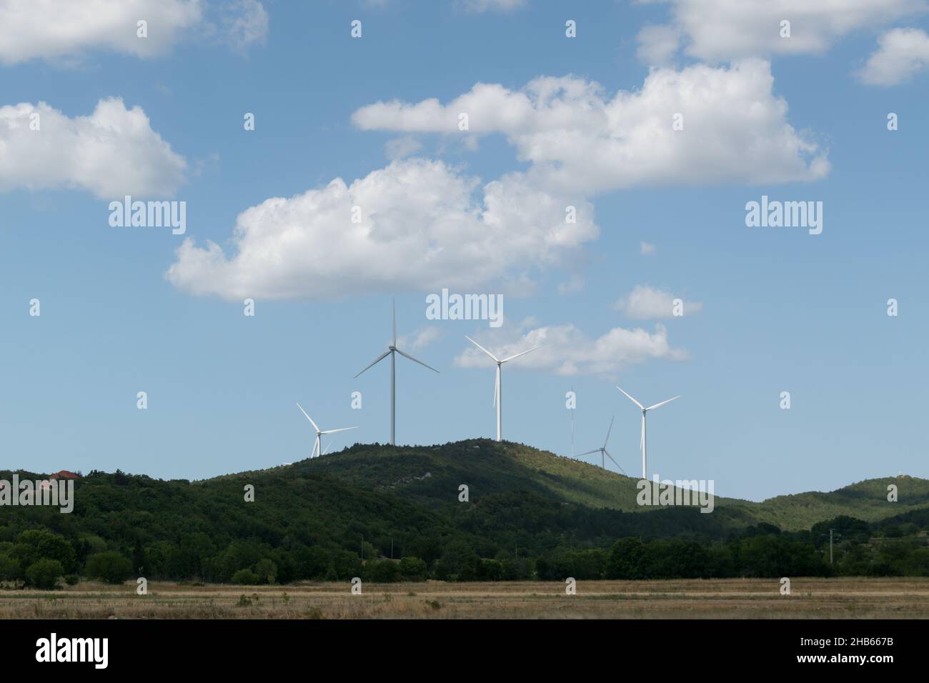 Wind turbines for electricity generation on a hill near Cista Provo ...