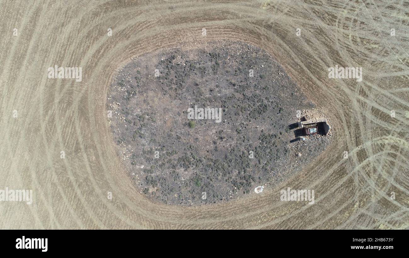 Aerial view of an Era with a shed in a dry land Stock Photo - Alamy