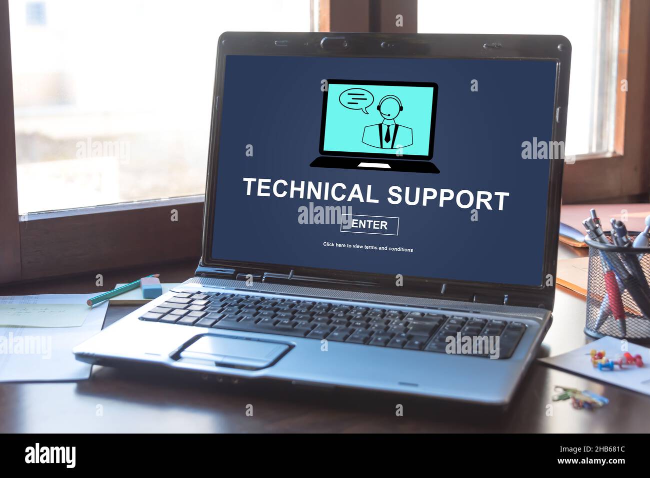 Laptop screen displaying a technical support concept Stock Photo - Alamy