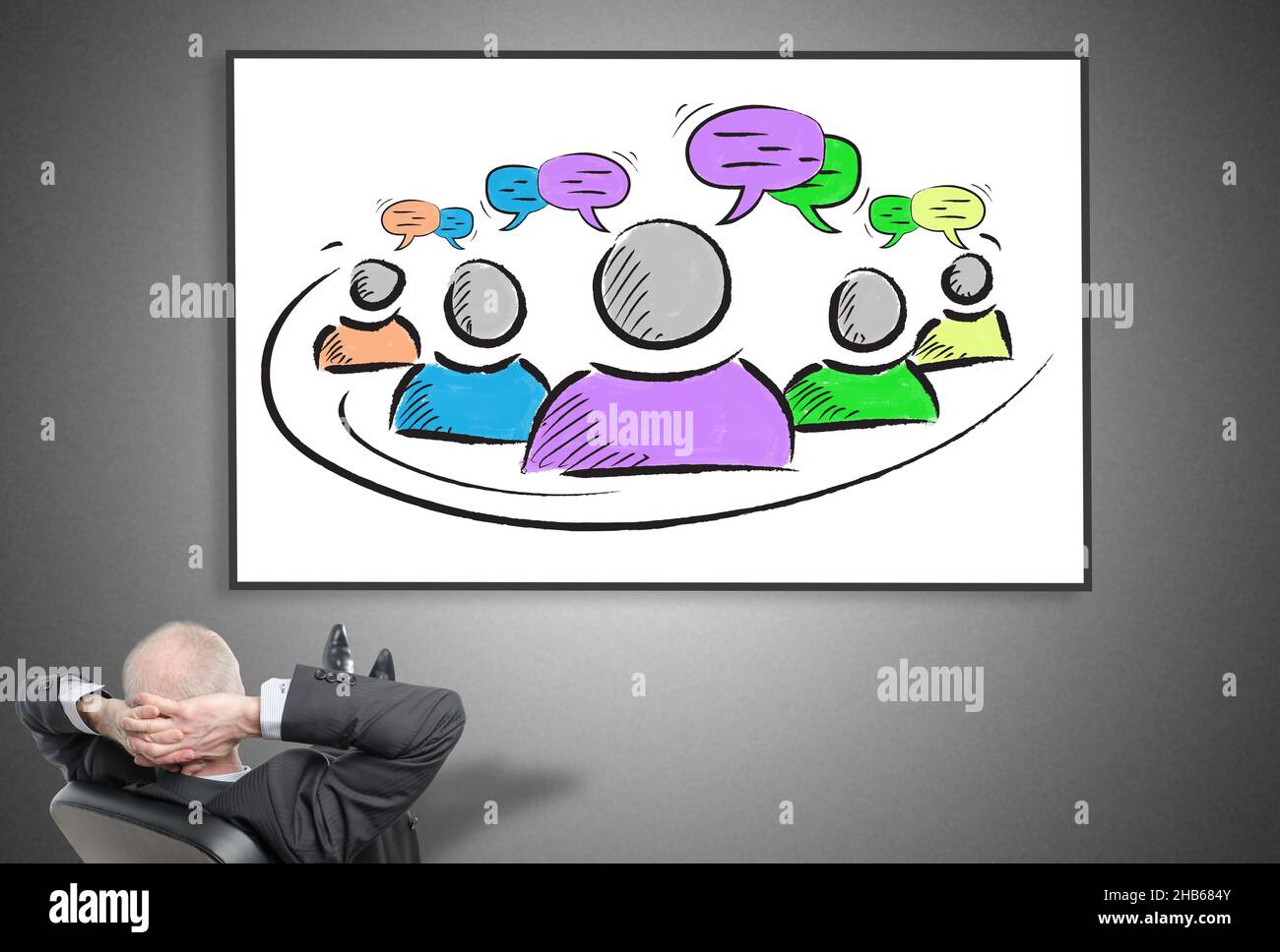 Relaxed businessman looking at leadership concept on a whiteboard Stock ...