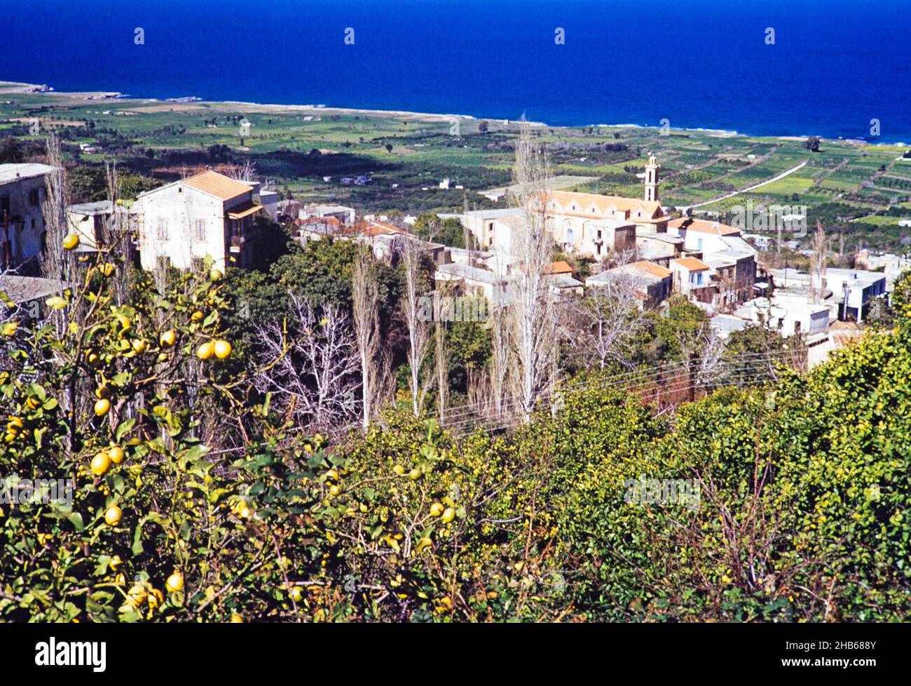 View over village towards coastal palin, Cyprus, 1963 location ...