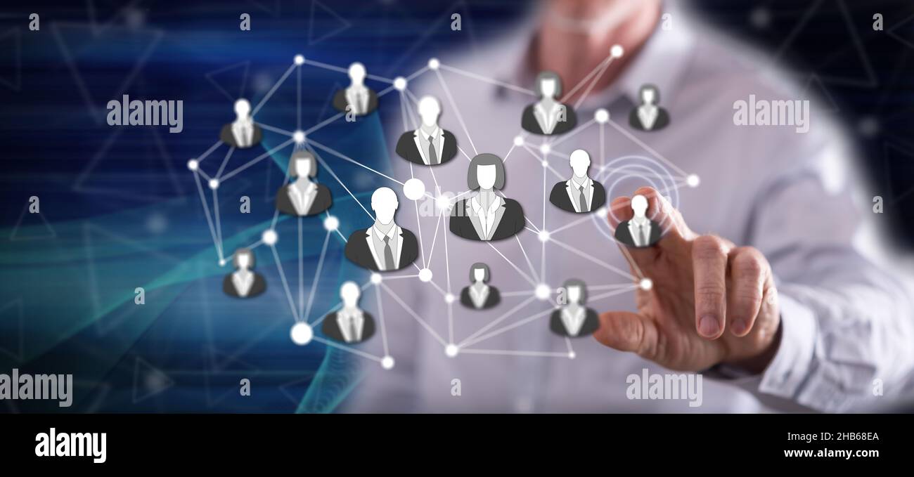 Man touching a cooperation concept on a touch screen with his finger ...