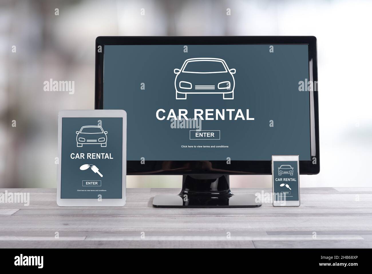 Car rental concept shown on different information technology devices ...