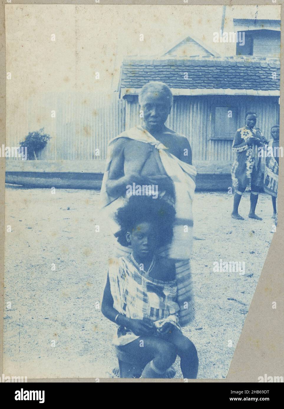 Seated maroon girl hi-res stock photography and images - Alamy