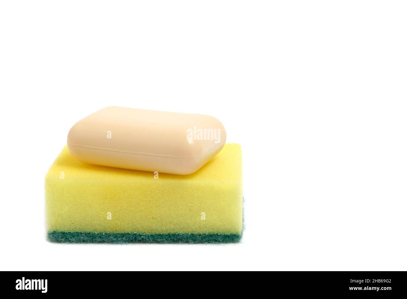 Sponge for washing dishes piece of soap on a white background Stock ...