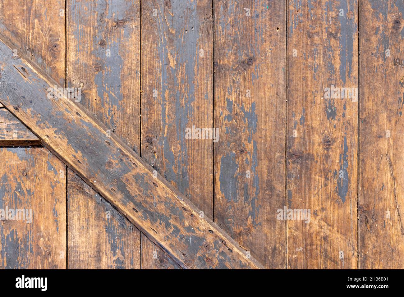 Detail of old oak partial doors also called N doors of a farm in the ...