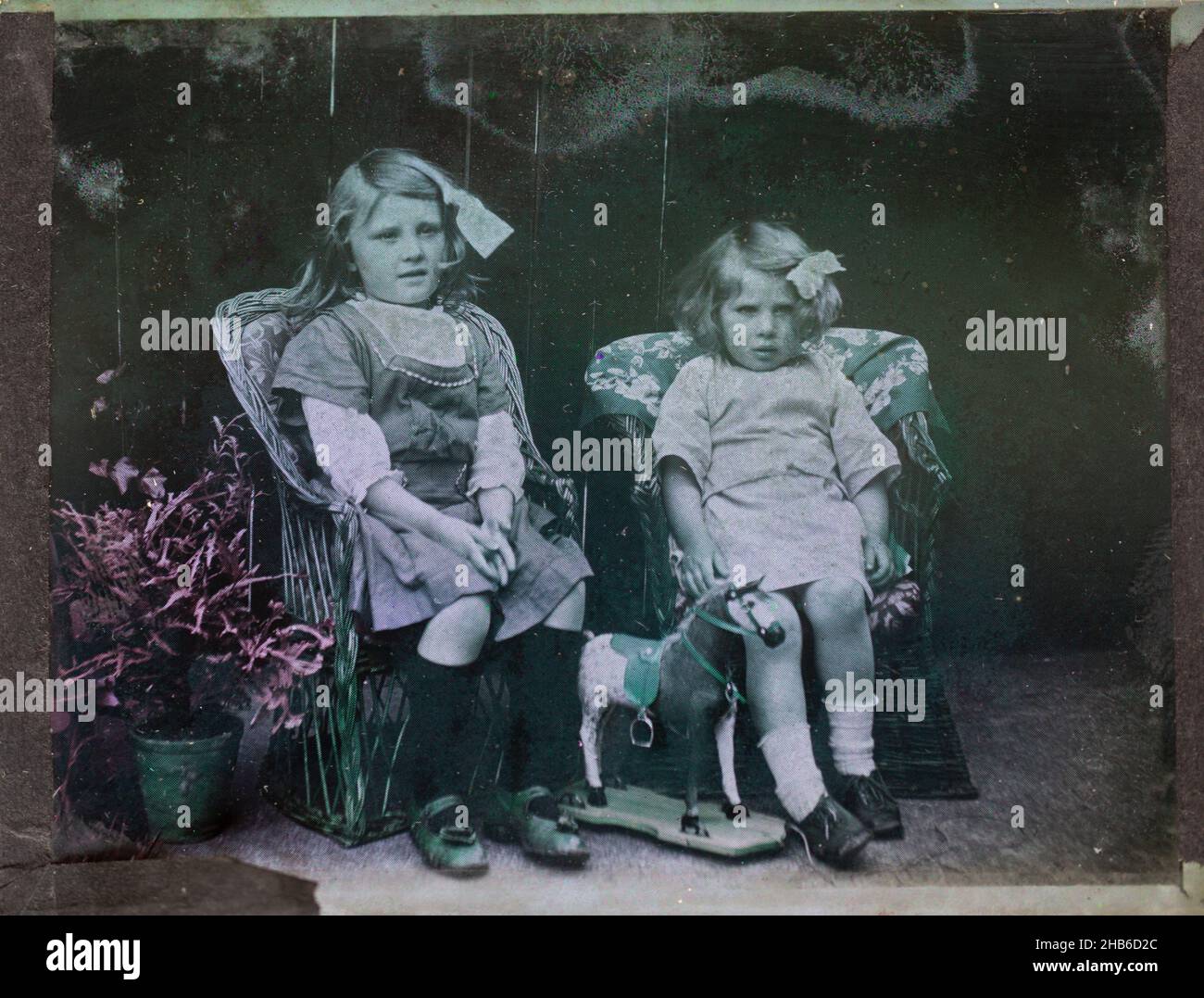 Paget process colourised magic lantern slide family portrait of two ...