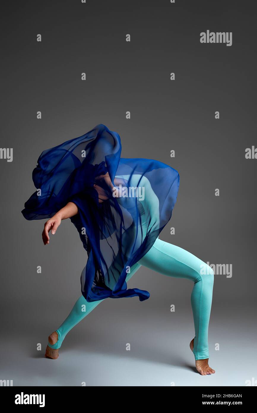 Ballerina Dancing with Silk Fabric, Modern Ballet Dancer in Fluttering ...