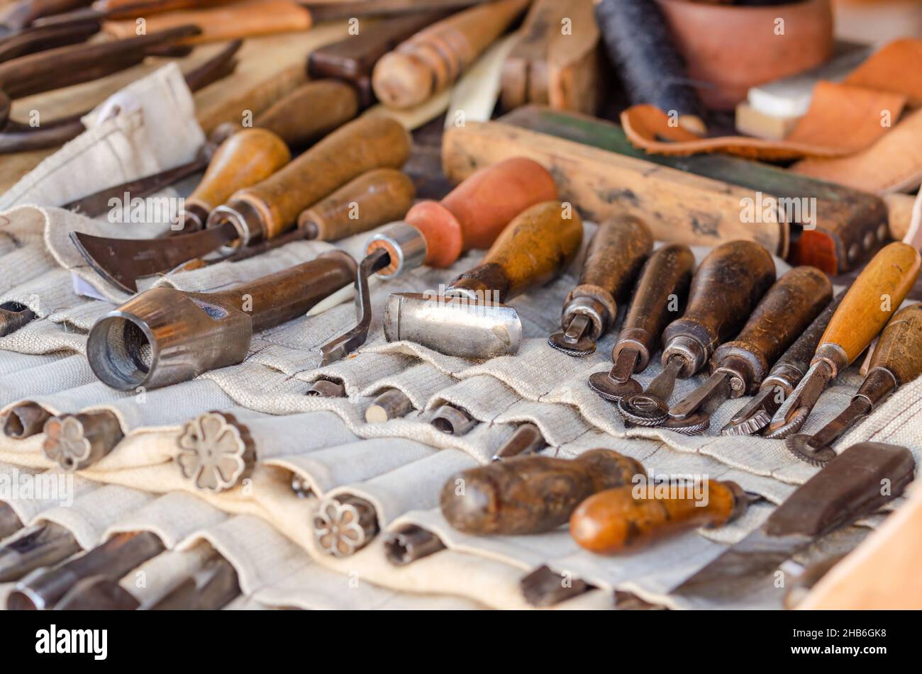 The equipment of the medieval leatherworker and manufacturer of shoes ...