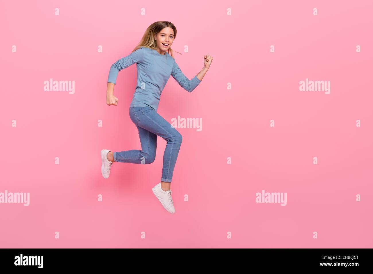 Full body profile side photo of youth lady runner energetic speed rush ...