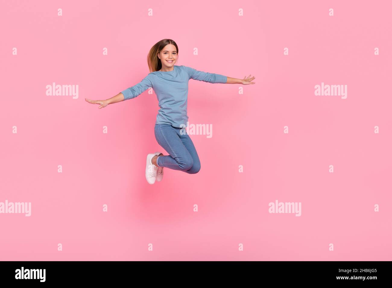 Full size photo of youth cheerful lady energetic jump up fly arms wings ...