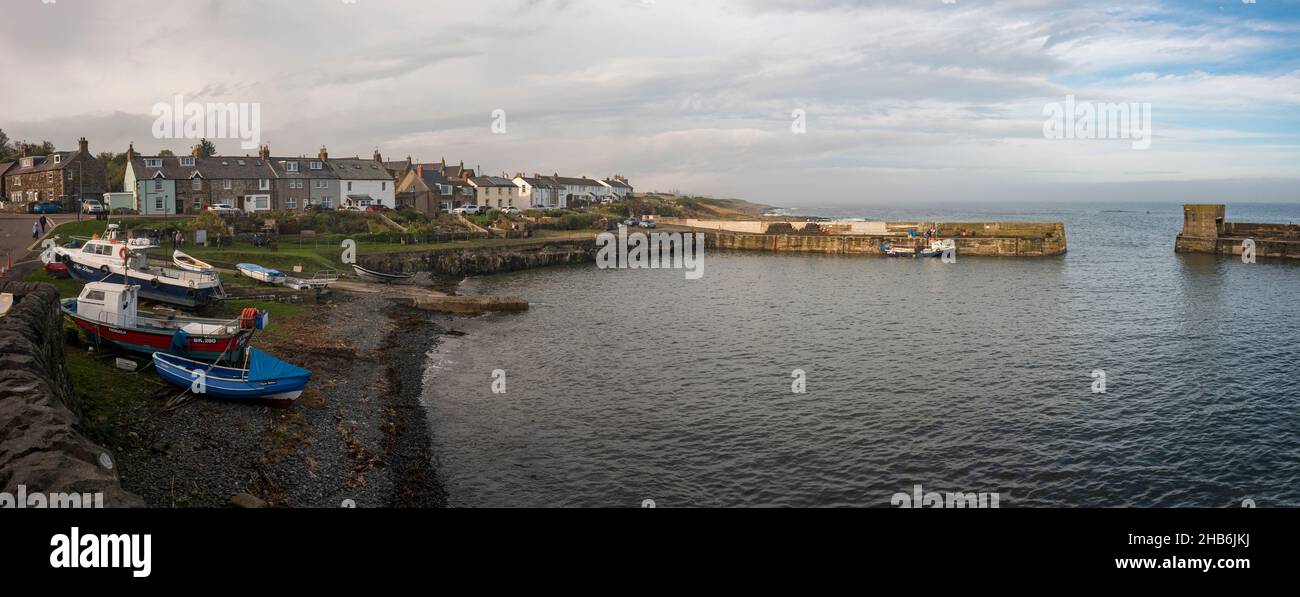 The small fishing village of Craster on the Northumberland coast, UK ...