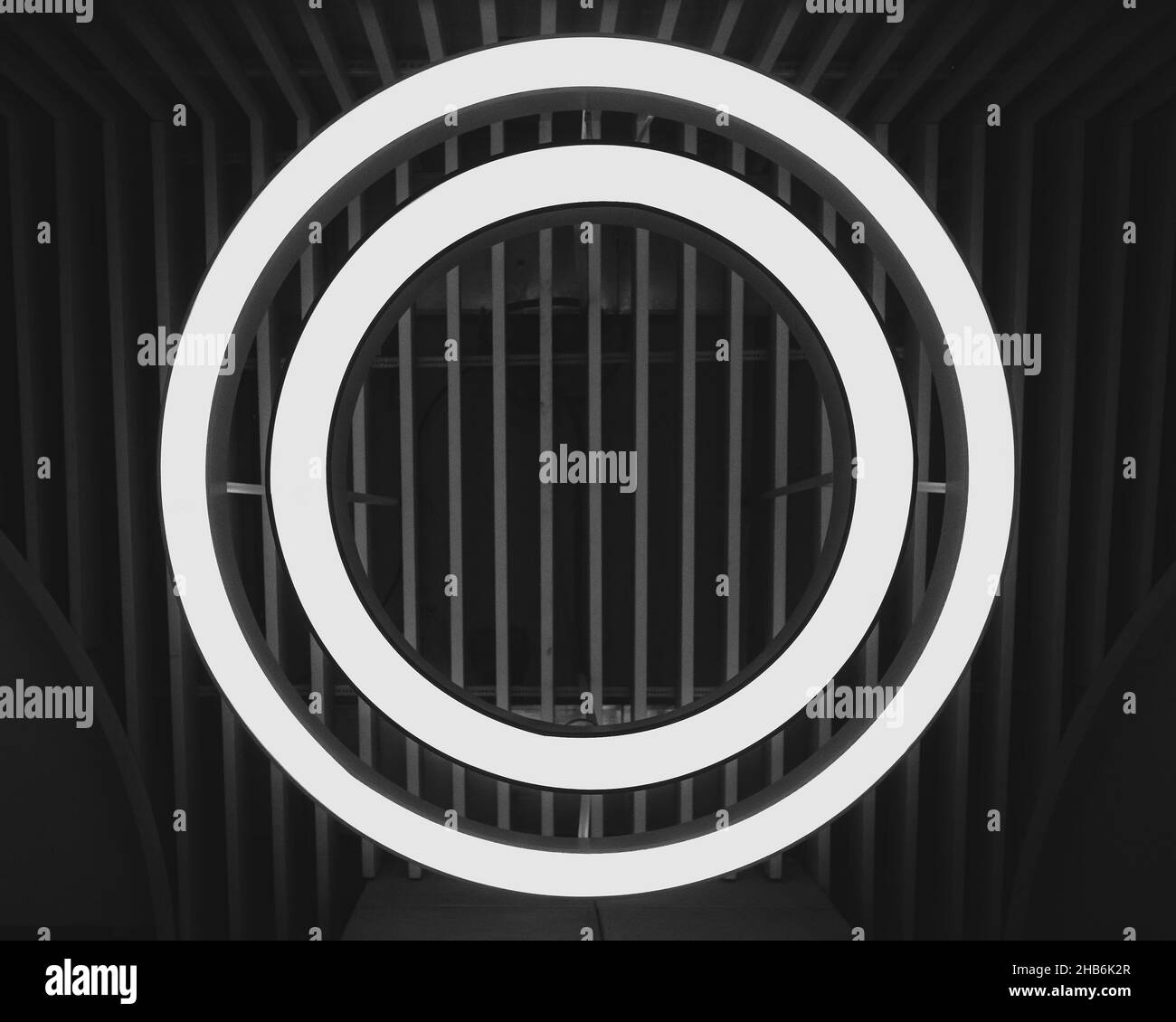 Luminous led ring lamp on the ceiling. Bottom view. Black and white ...