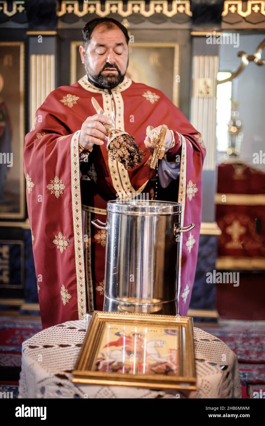 Holy water consecration in orthodox church. Religious priest during ...