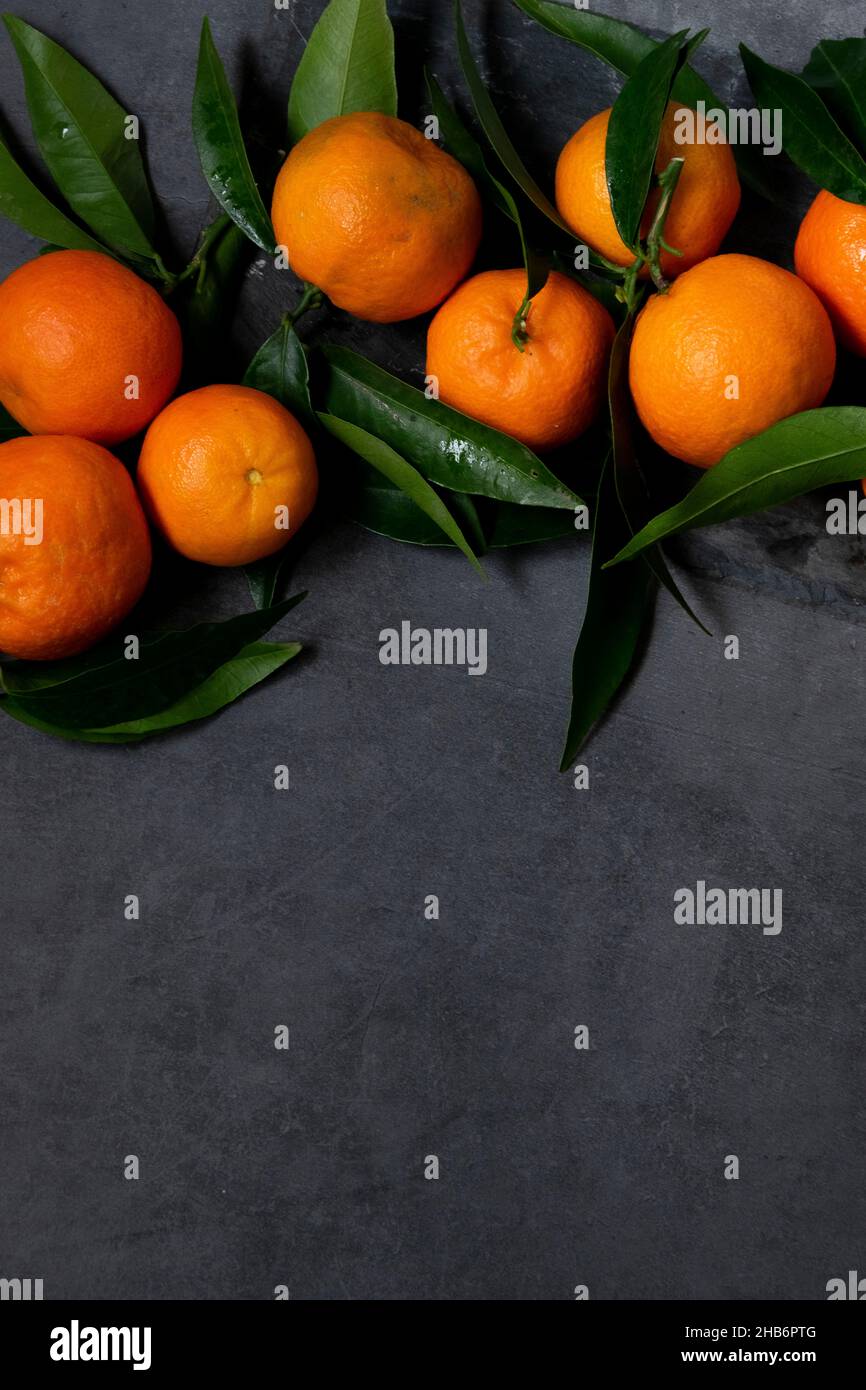 Fresh raw tangerine on dark background, healthy food ingredients Stock ...