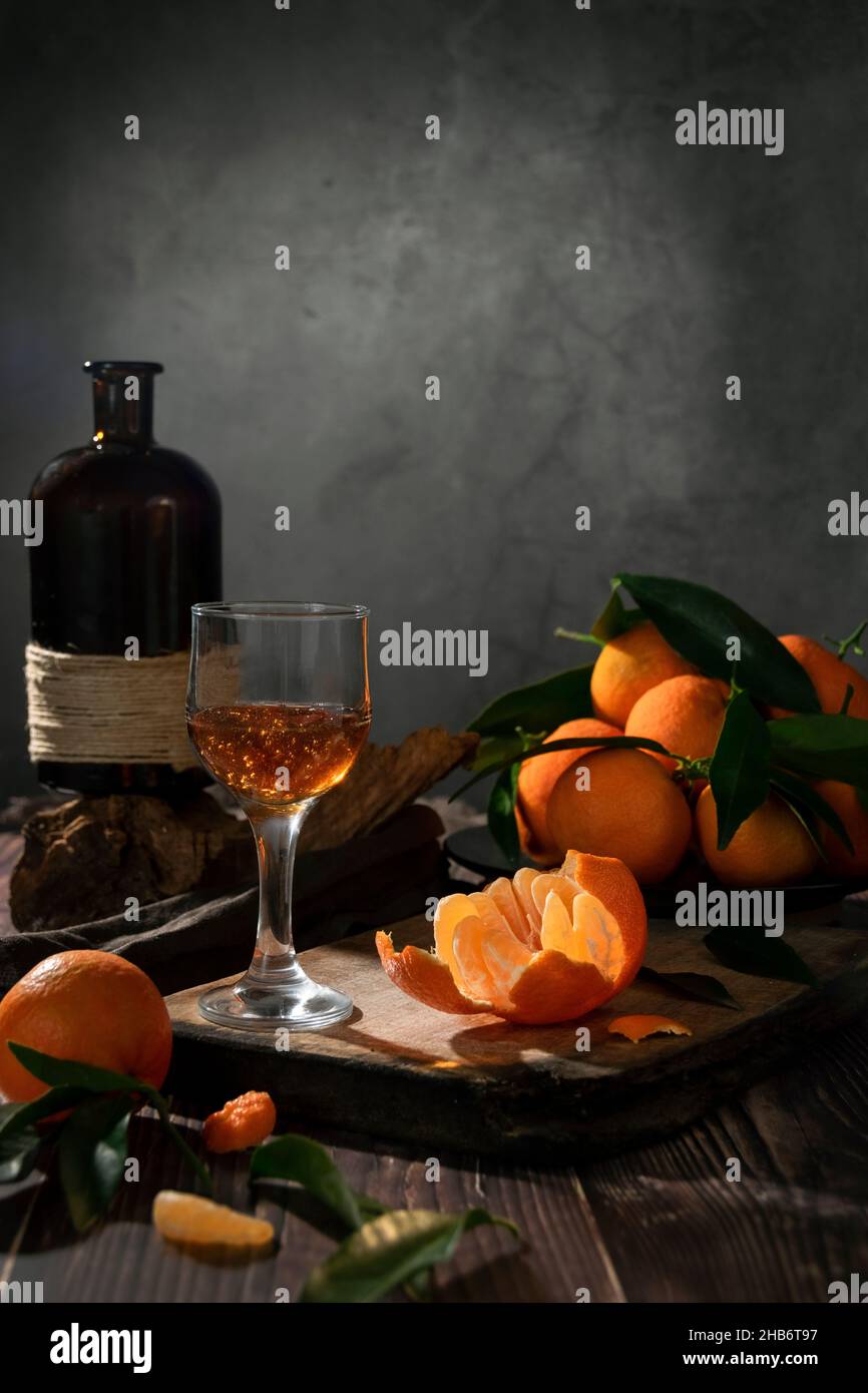 Homemade tangerine alcohol drink, rustic beverage still life Stock ...