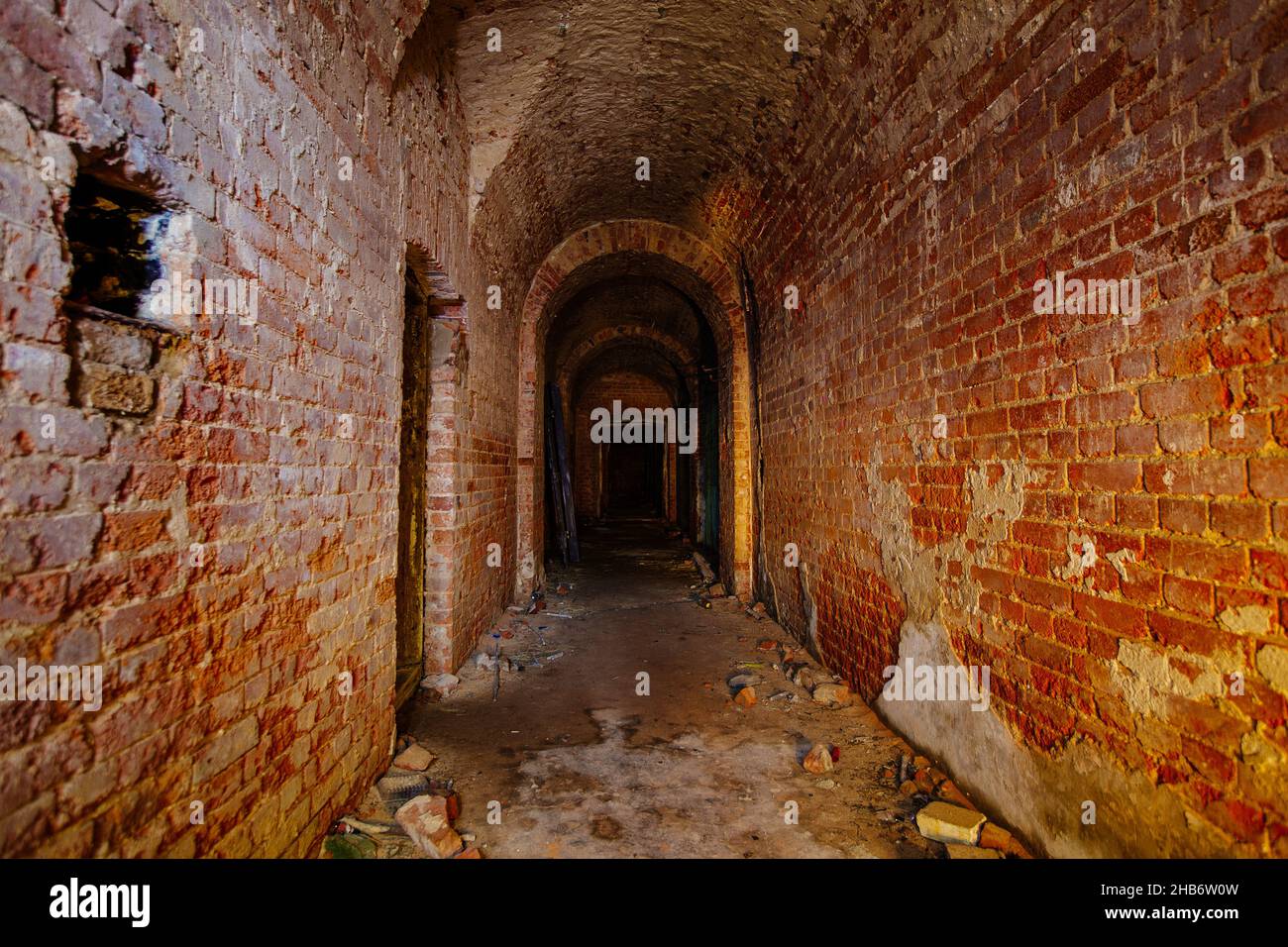 Vaulted red brick dungeon under old castle Stock Photo - Alamy