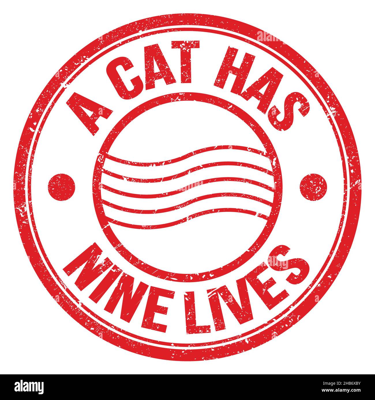 A CAT HAS NINE LIVES text written on red round postal stamp sign Stock ...