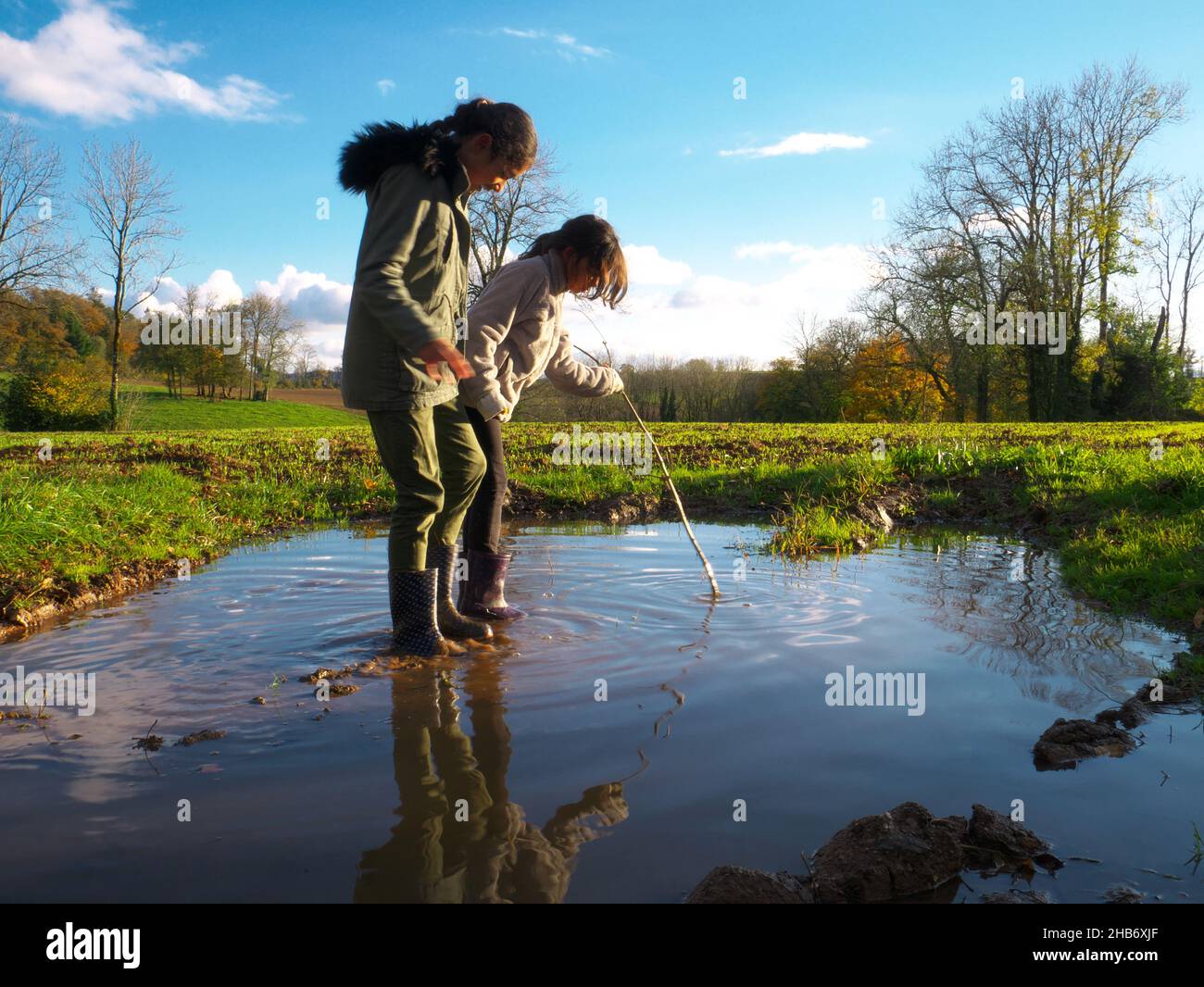 Child puddle wood hi-res stock photography and images - Alamy