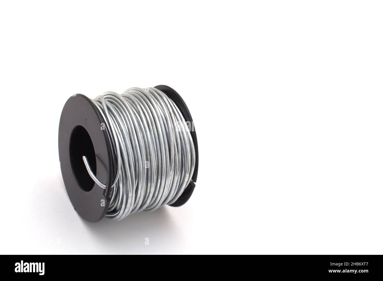 Roll Of Steel Wire On White Stock Photo - Alamy