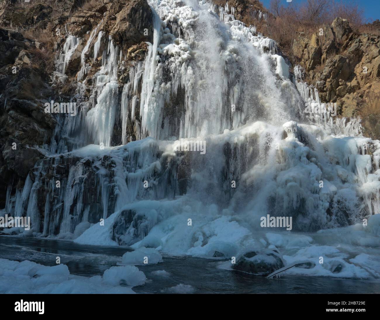 Srinagar, India. 17th Dec, 2021. A general view of frozen waterfall ...