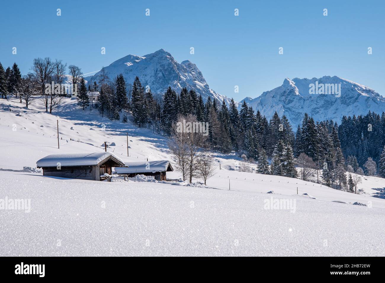 Idyllic winter landscape with alpine huts in Austria, Heutal, Unken ...