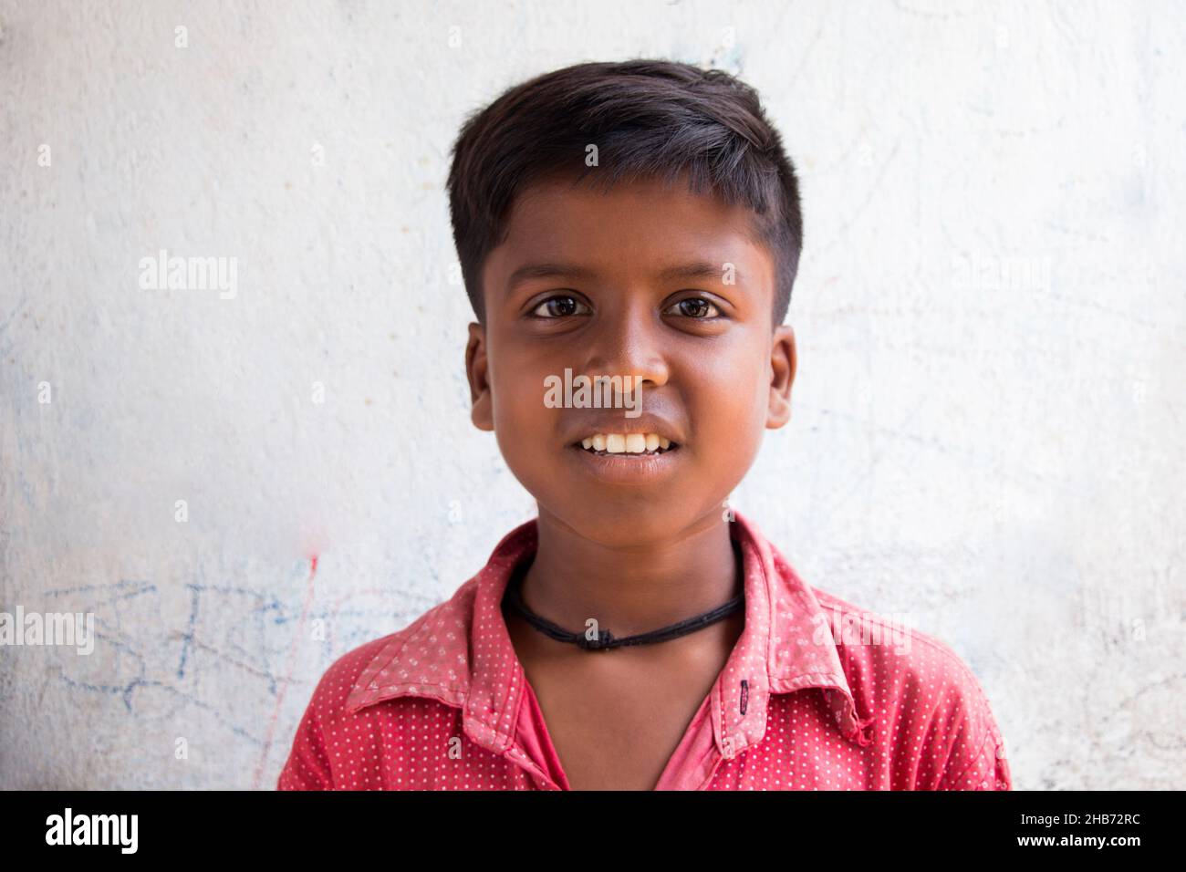 Portrait of a young rural boy smiling Stock Photo - Alamy