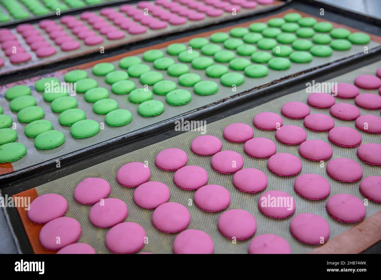 Production of macarons. Preparation of pink dough. Pink Buttercream ...