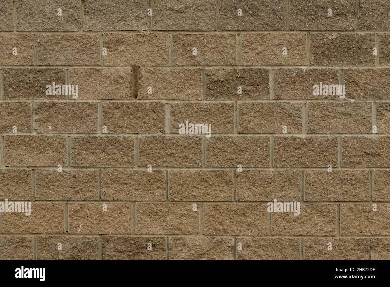 Wall of bricks painted with a pale peach paint Texture of masonry ...