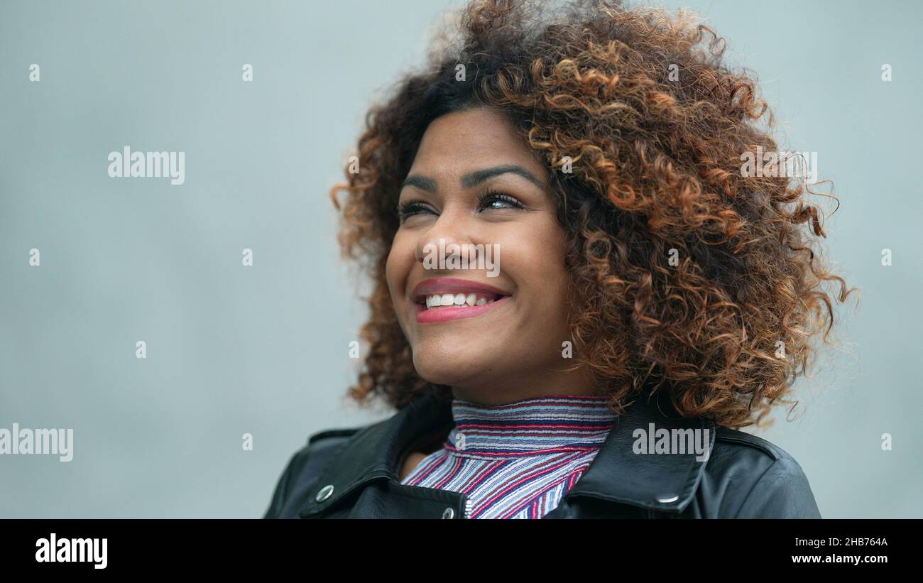 Carefree black woman portrait smiling feeling free Stock Photo - Alamy