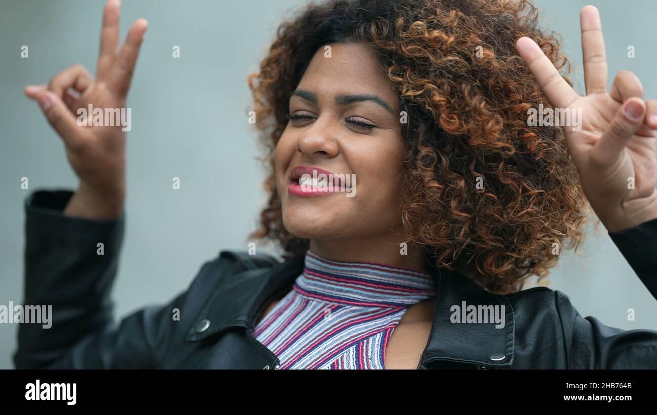 Carefree black woman portrait smiling feeling free Stock Photo - Alamy