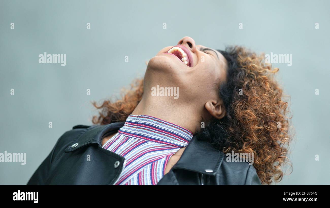 Carefree black woman portrait smiling feeling free Stock Photo - Alamy