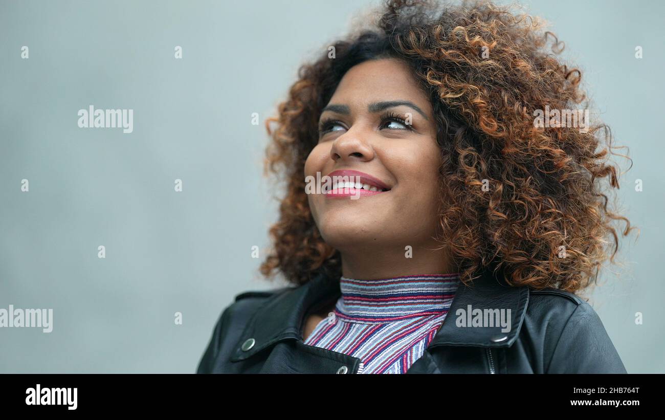 Carefree black woman portrait smiling feeling free Stock Photo - Alamy