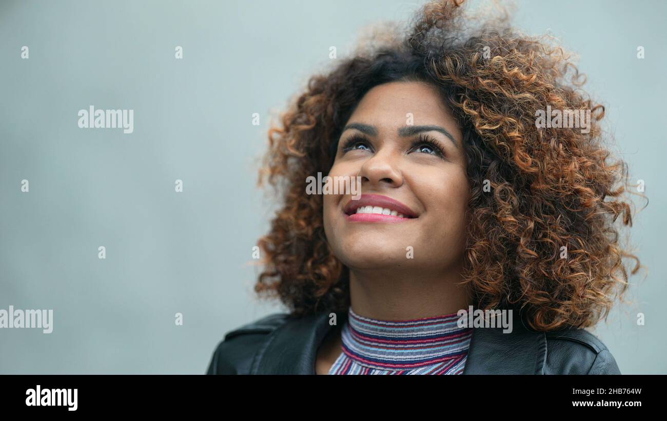 Carefree black woman portrait smiling feeling free Stock Photo - Alamy