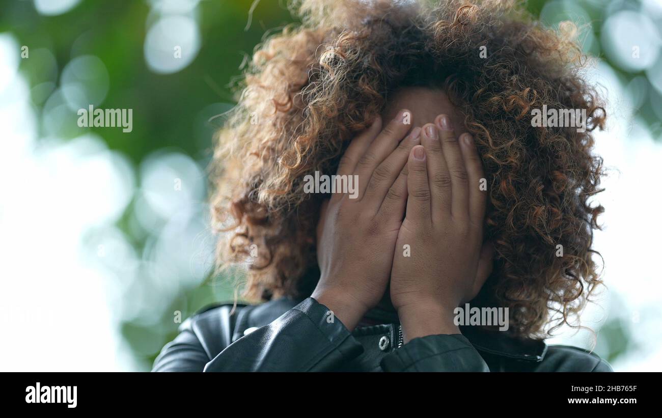 Troubled black African woman feeling anxiety and despair Stock Photo ...