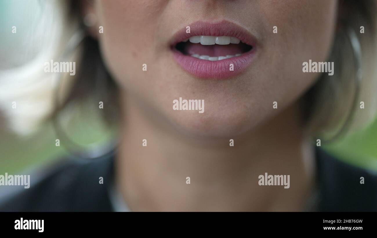 Woman mouth speaking to camera. Girl lips close-up lips talking Stock ...