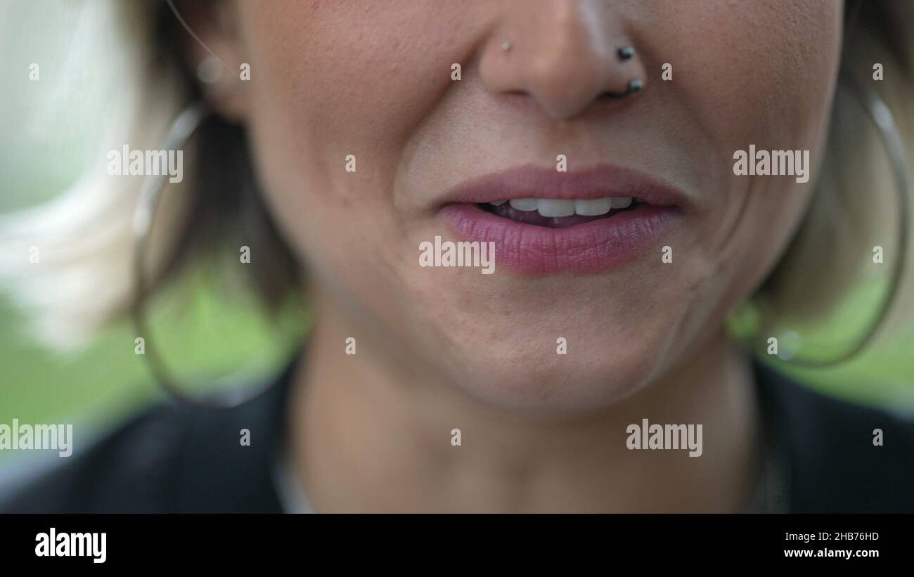Woman mouth speaking to camera. Girl lips close-up lips talking Stock ...