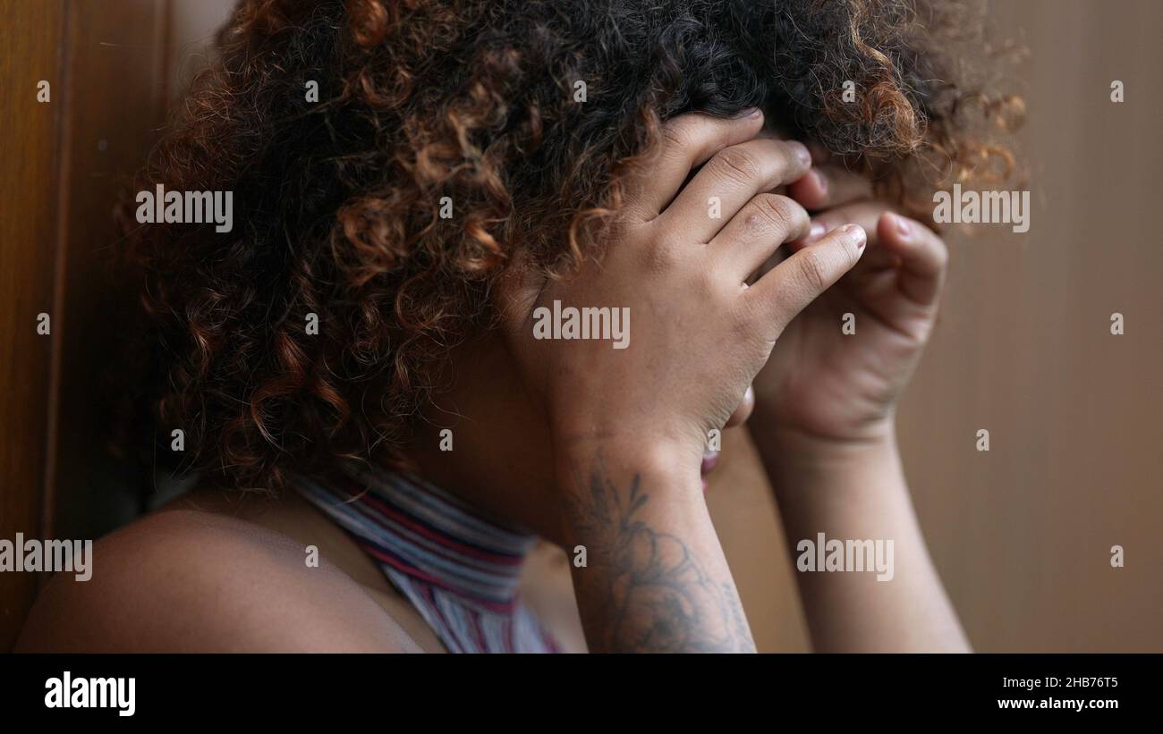 Worried black African woman suffering from emotional problems Stock ...
